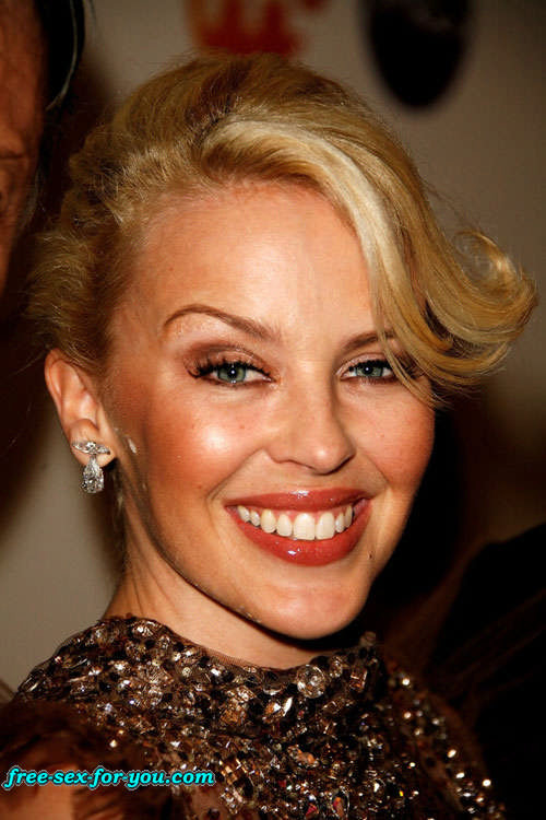 Kylie Minogue Showing Her Tits And Posing In See Thru Dress Porn